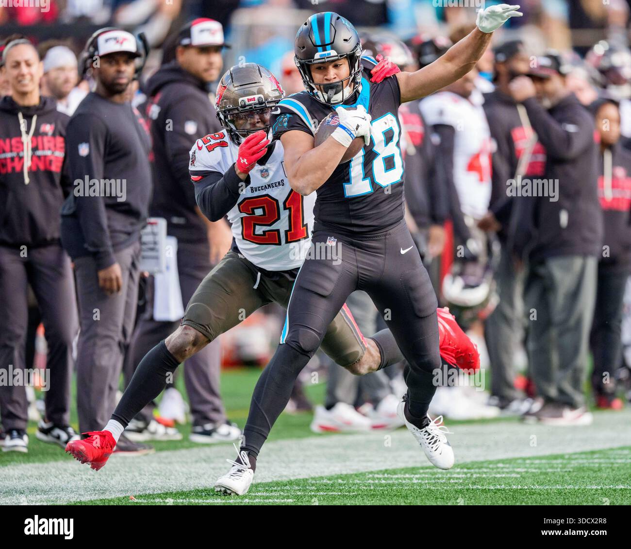 Tampa Bay Buccaneers cornerback Benjamin Morrison (21) tackles Carolina ...