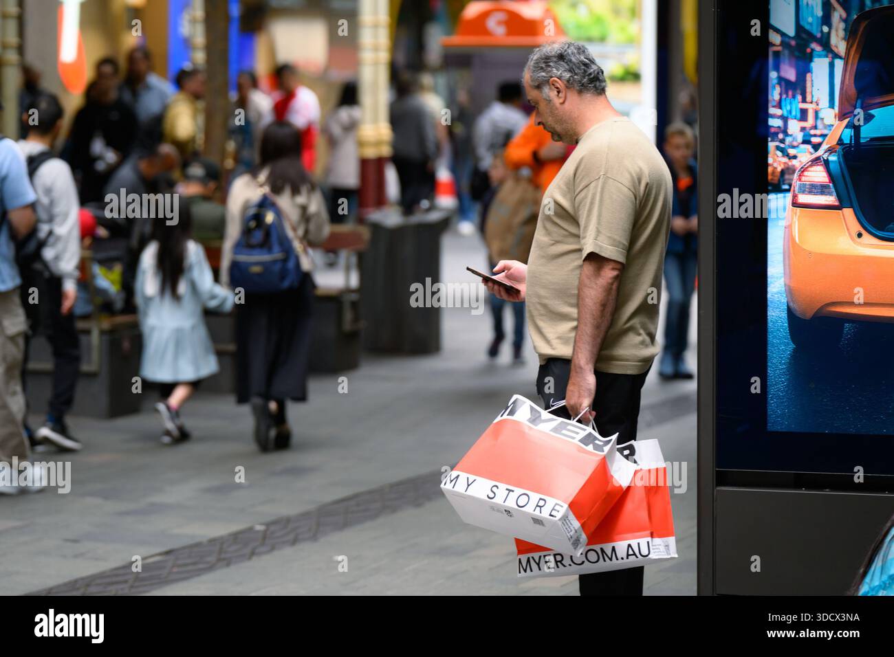 A person carries shopping bag is seen during Boxing Day sales at Pitt ...