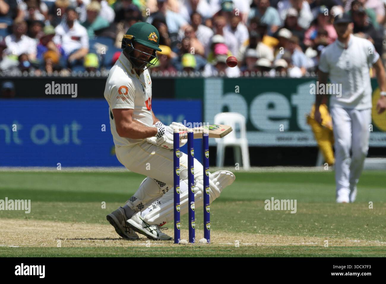 Australia's Michael Neser avoids a delivery from England's Josh Tongue ...