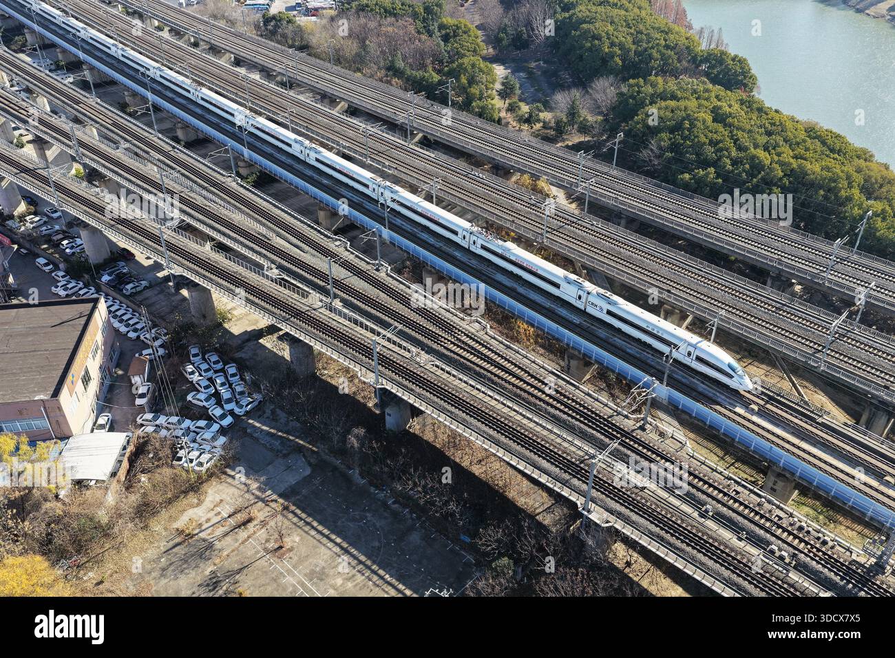 NANJING, CHINA - DECEMBER 26, 2025 - A bullet train is running in ...