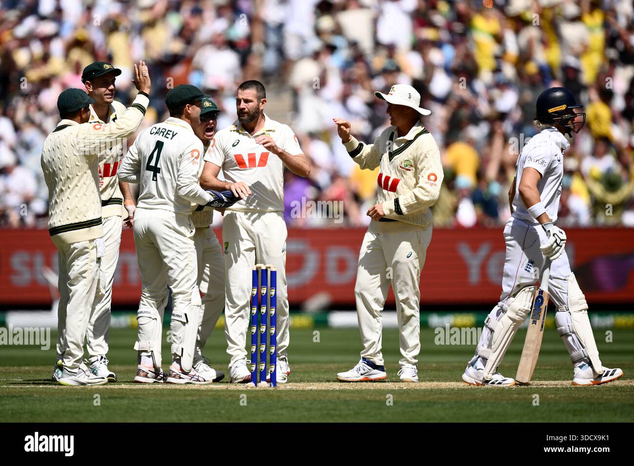 Michael Neser of Australia (centre) celebrates taking the wicket of ...