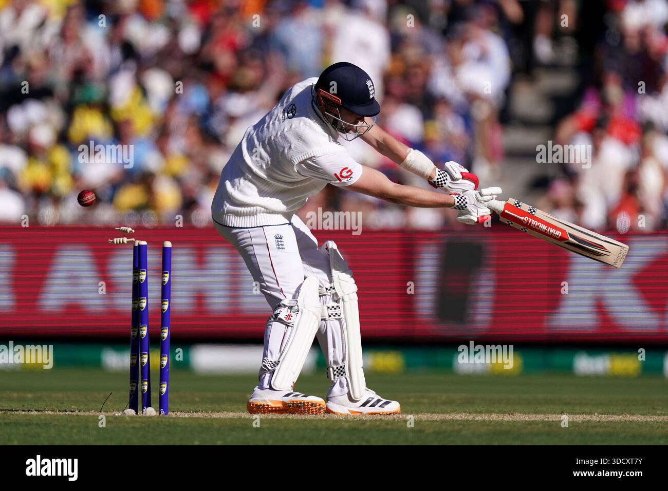England’s Gus Atkinson is bowled by Australia's Cameron Green (not ...