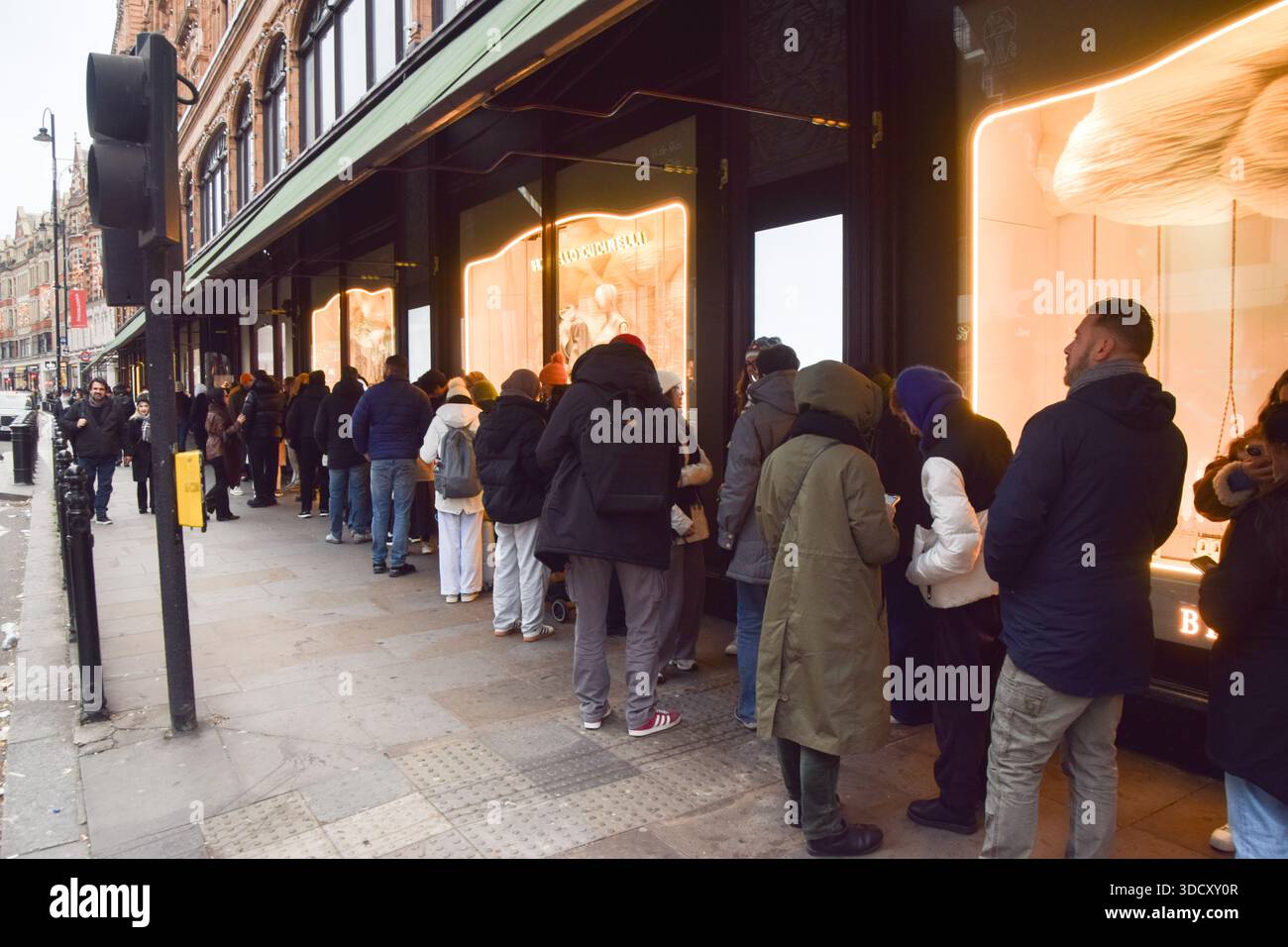 London, UK. 26th December 2025. People queue outside Harrods in ...