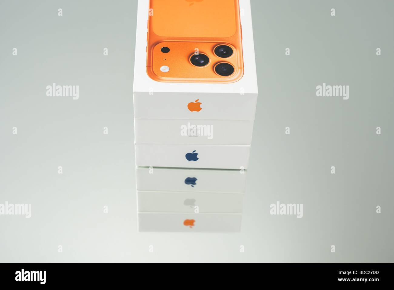 Germany Berlin December 25, 2025. Stacked iPhone 17 Pro boxes showing ...