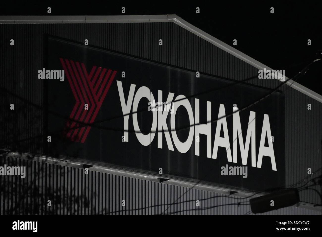 A photo shows the logo of Yokohama Rubber Company Mishima Plant in ...