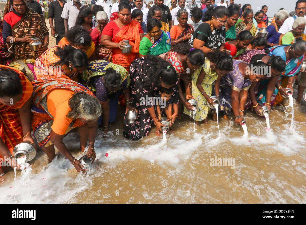 “In silent remembrance — people gather at Pattinapakkam beach, Chennai ...