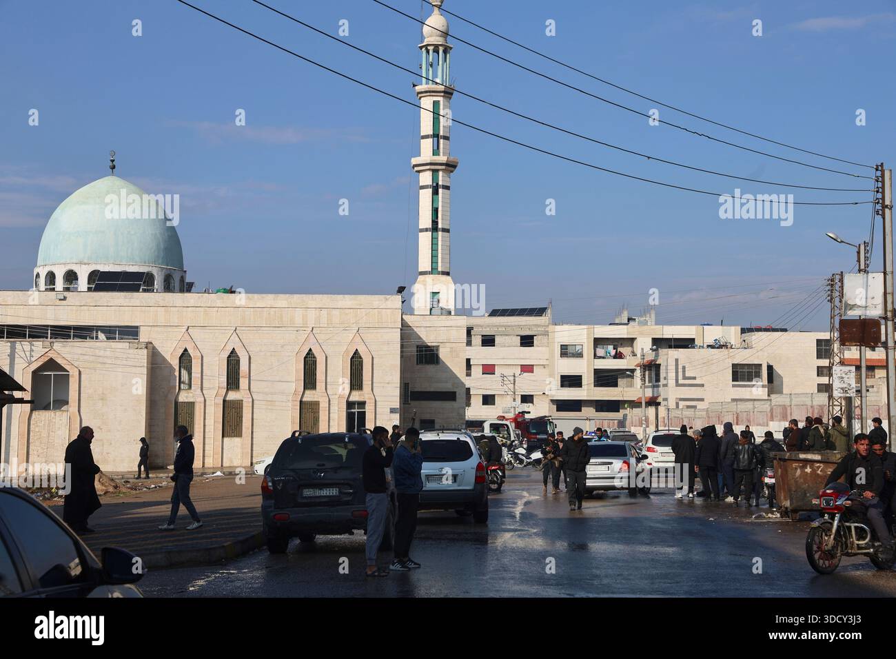 Syrian security forces secure the area outside the Imam Ali bin Abi ...