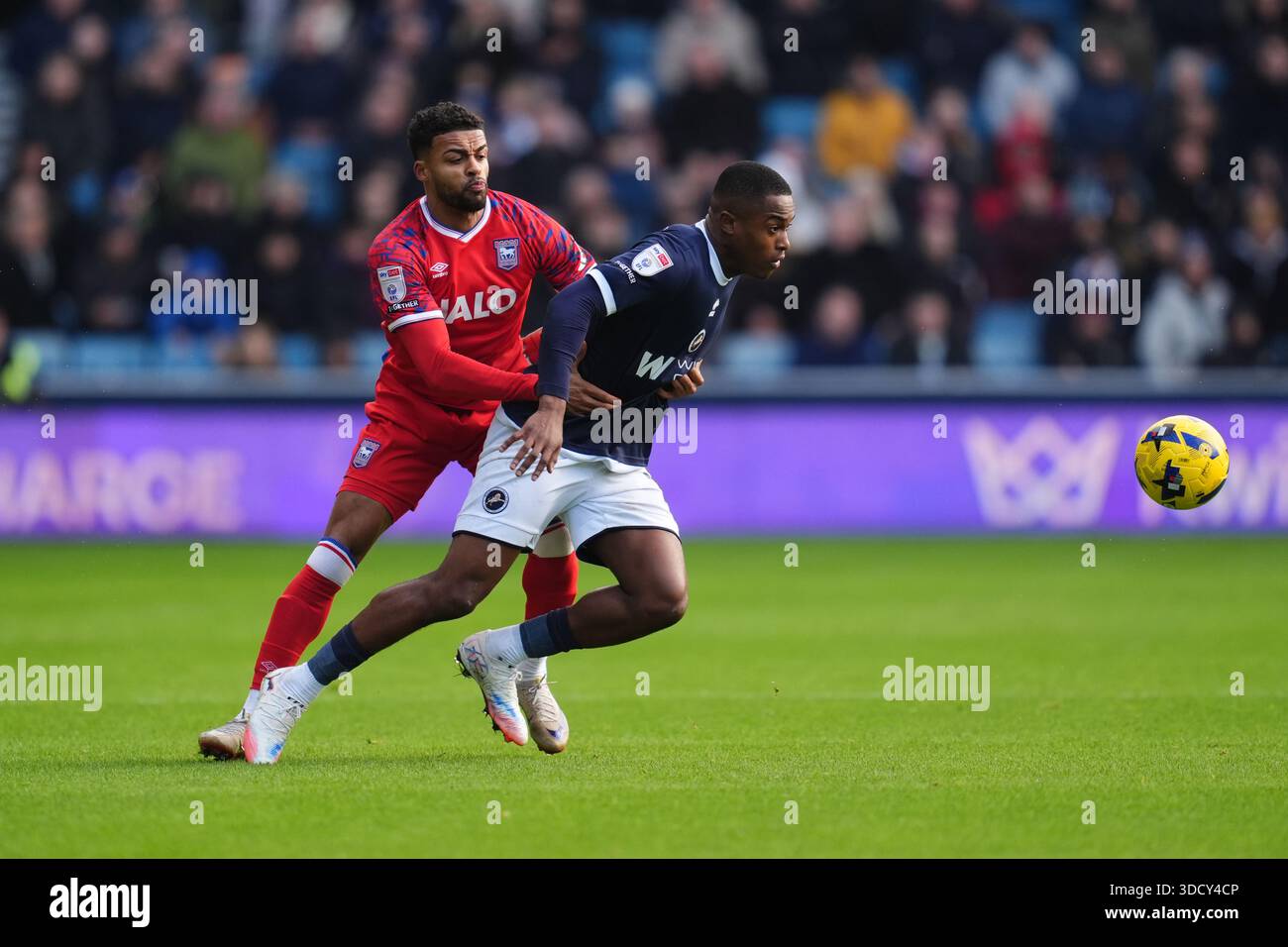 Ipswich Town's Darnell Furlong (left) and Millwall's Aidomo Emakhu ...