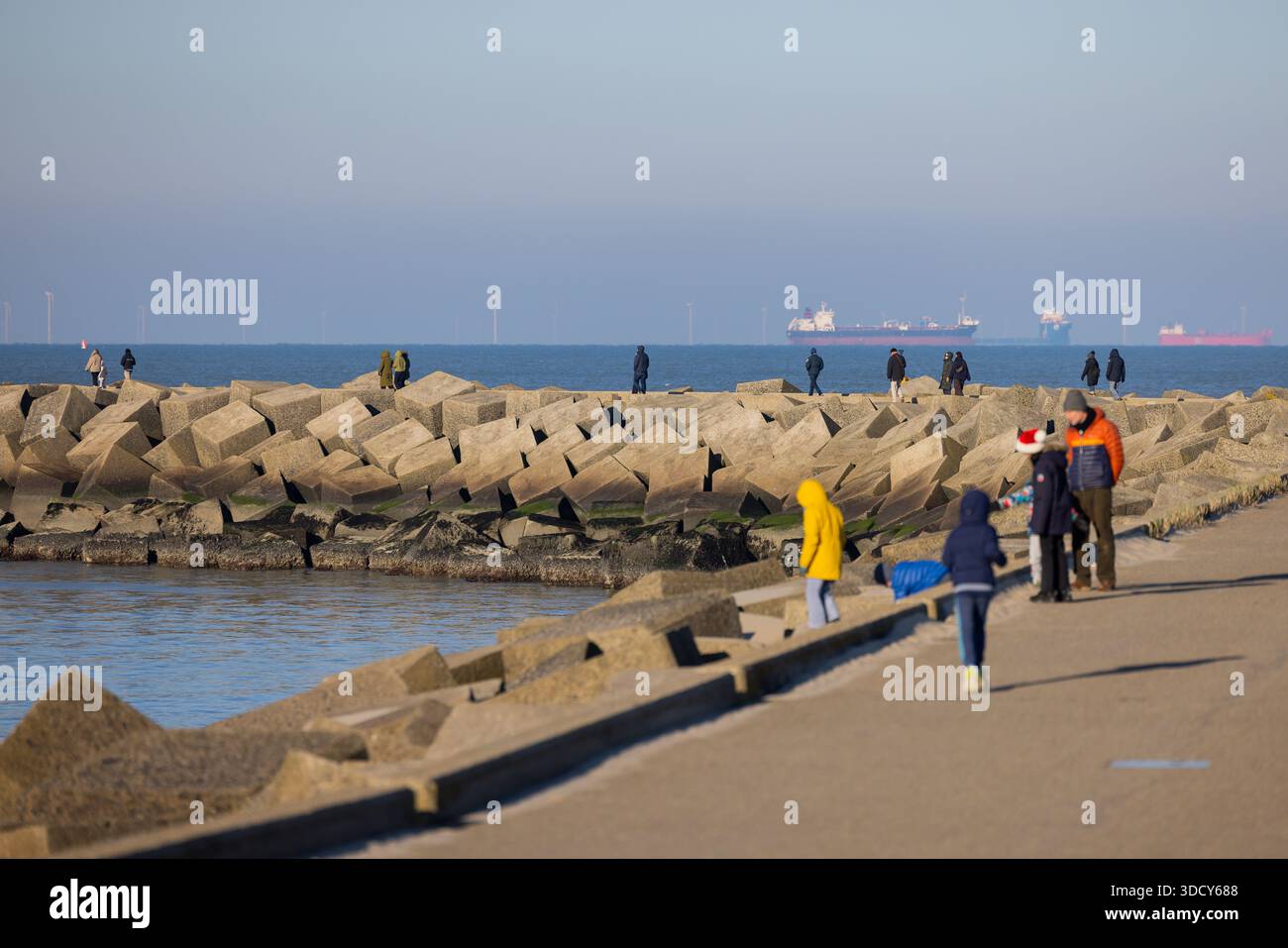 SCHEVENINGEN - Day trippers enjoy a breath of fresh air on the beach of ...