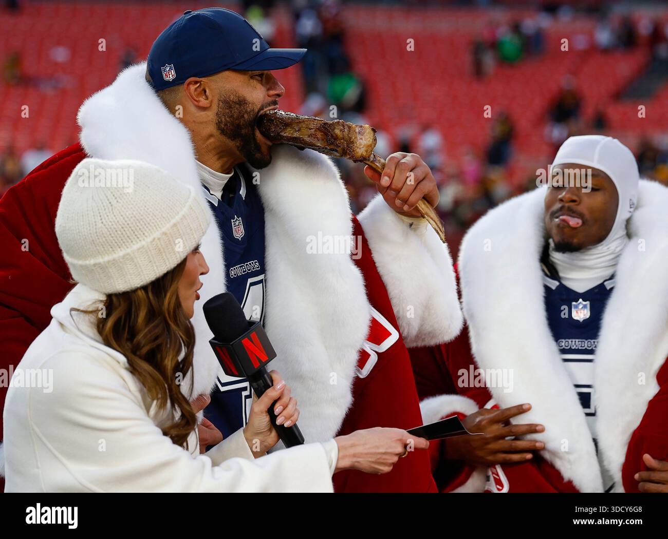 Dec 25, 2025: Dallas Cowboys QB #4 Dak Prescott enjoys a bite of a ...