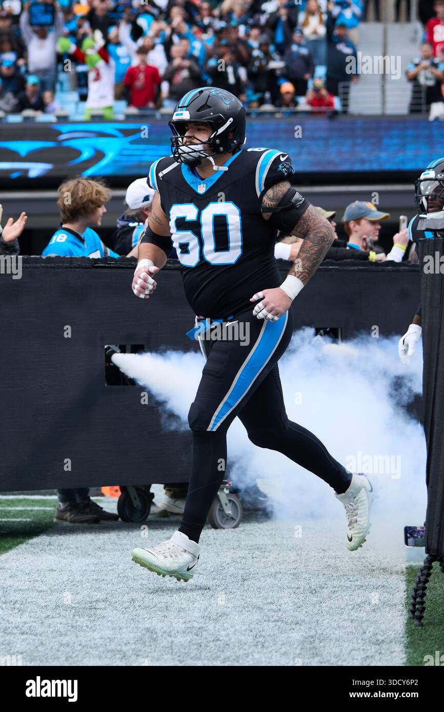 Carolina Panthers center Nick Samac (60) runs on to the field prior to ...