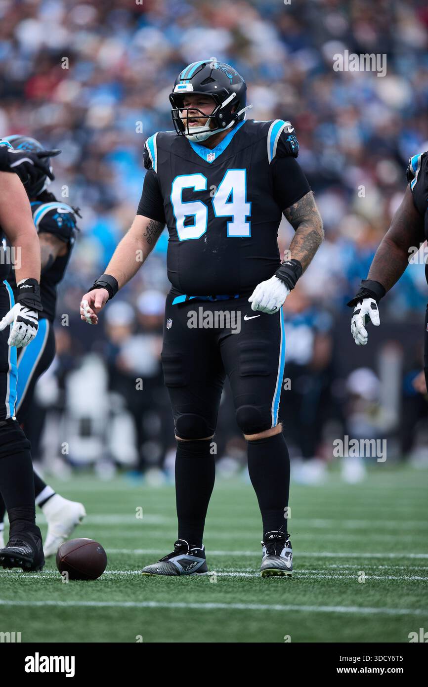 Carolina Panthers center Cade Mays (64) walks up to the line of ...