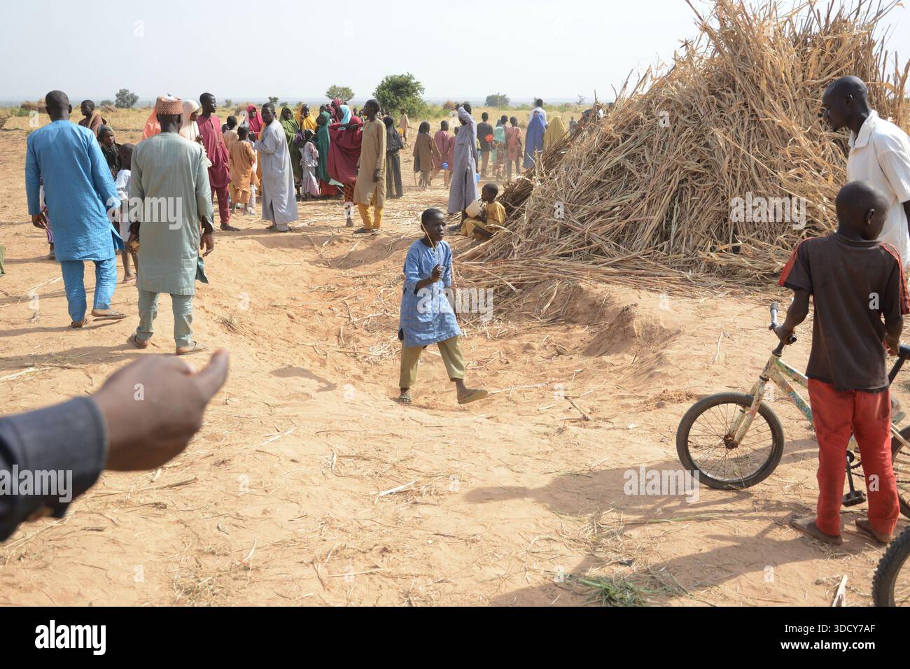 People visit the site of a U.S. airstrike in Northwest, Jabo, Nigeria, Friday, Dec. 26, 2025 ...