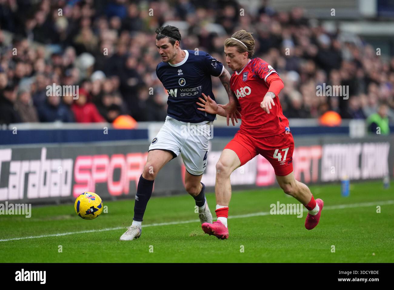 Millwall's Tristan Crama (left) and Ipswich Town's Jack Clarke battle ...