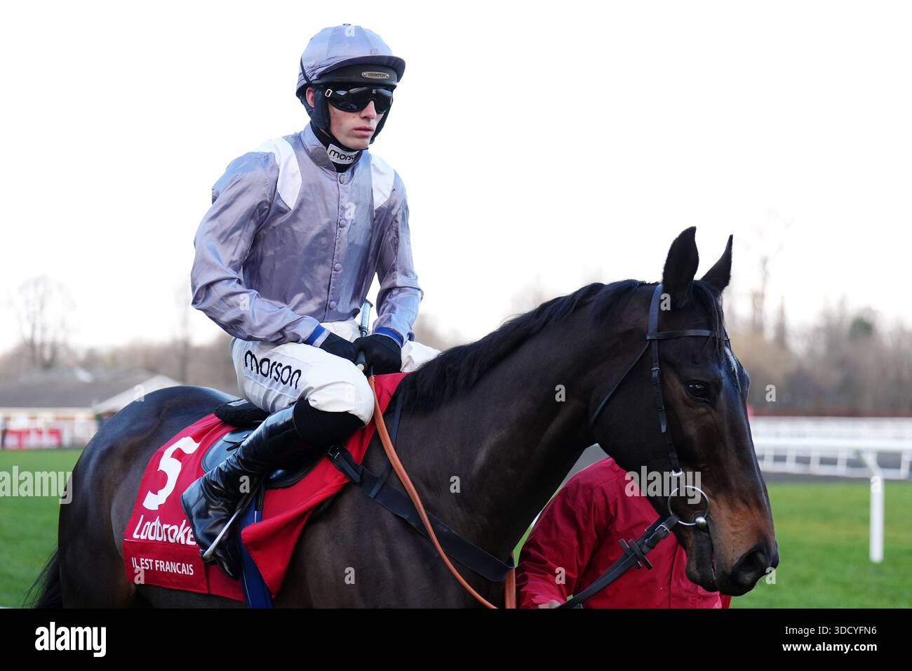 Il Est Francais ridden by Harry Cobden goes to post for the Ladbrokes ...