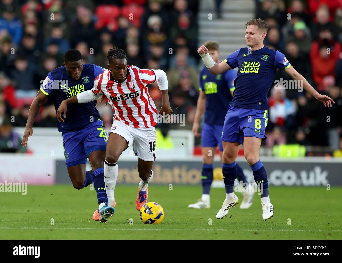 Preston North End's Thierry Small (left) and Stoke City's Bosun Lawal ...