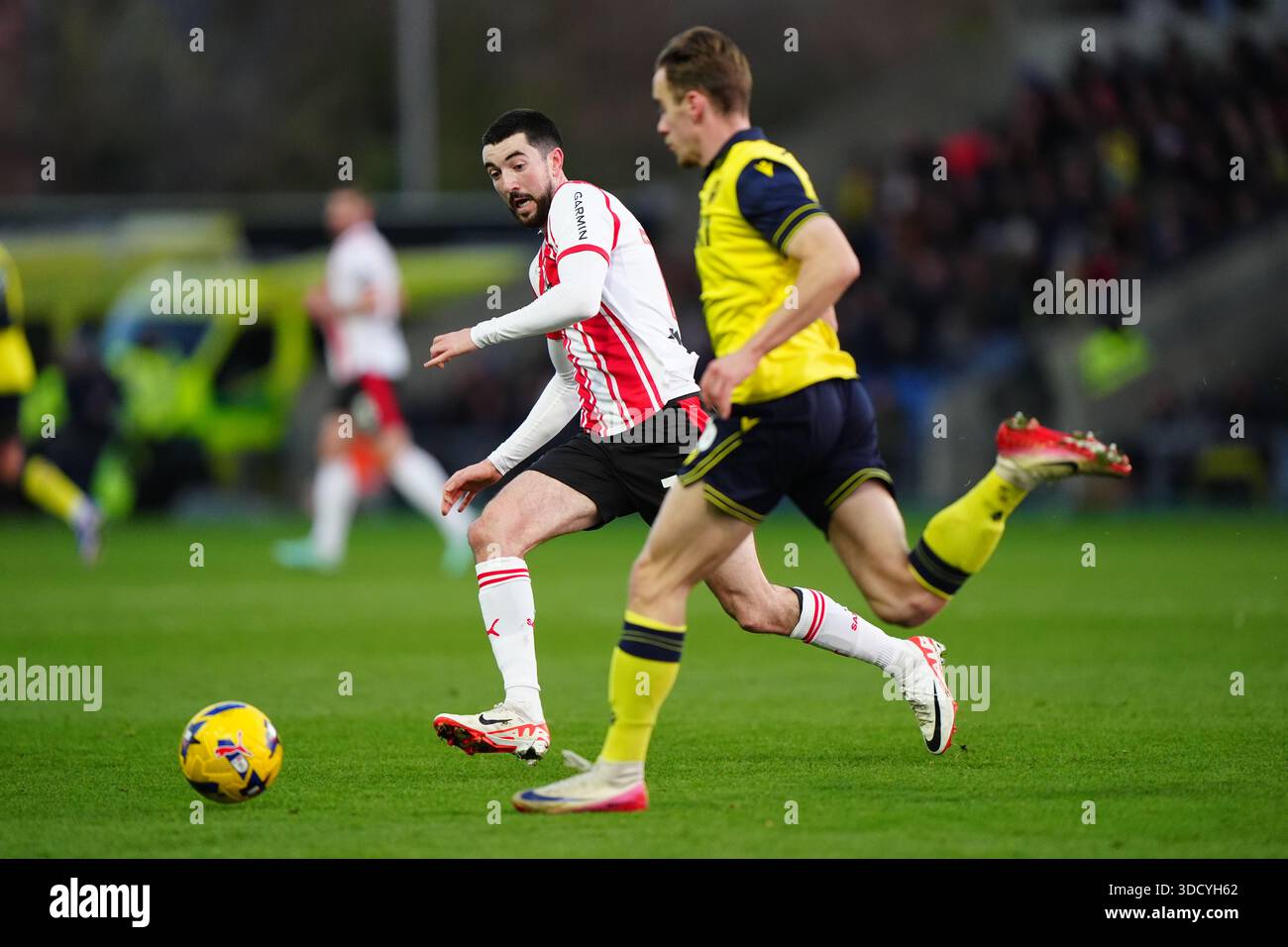 Oxford United's Jack Currie (right) and Southampton's Finn Azaz battle ...