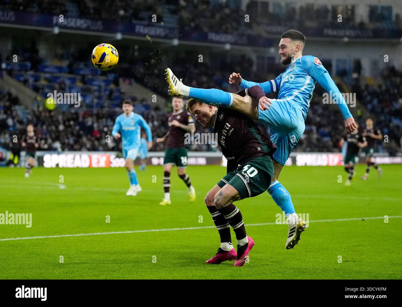 Coventry City's Matt Grimes (right) and Swansea City's Ethan Galbraith ...