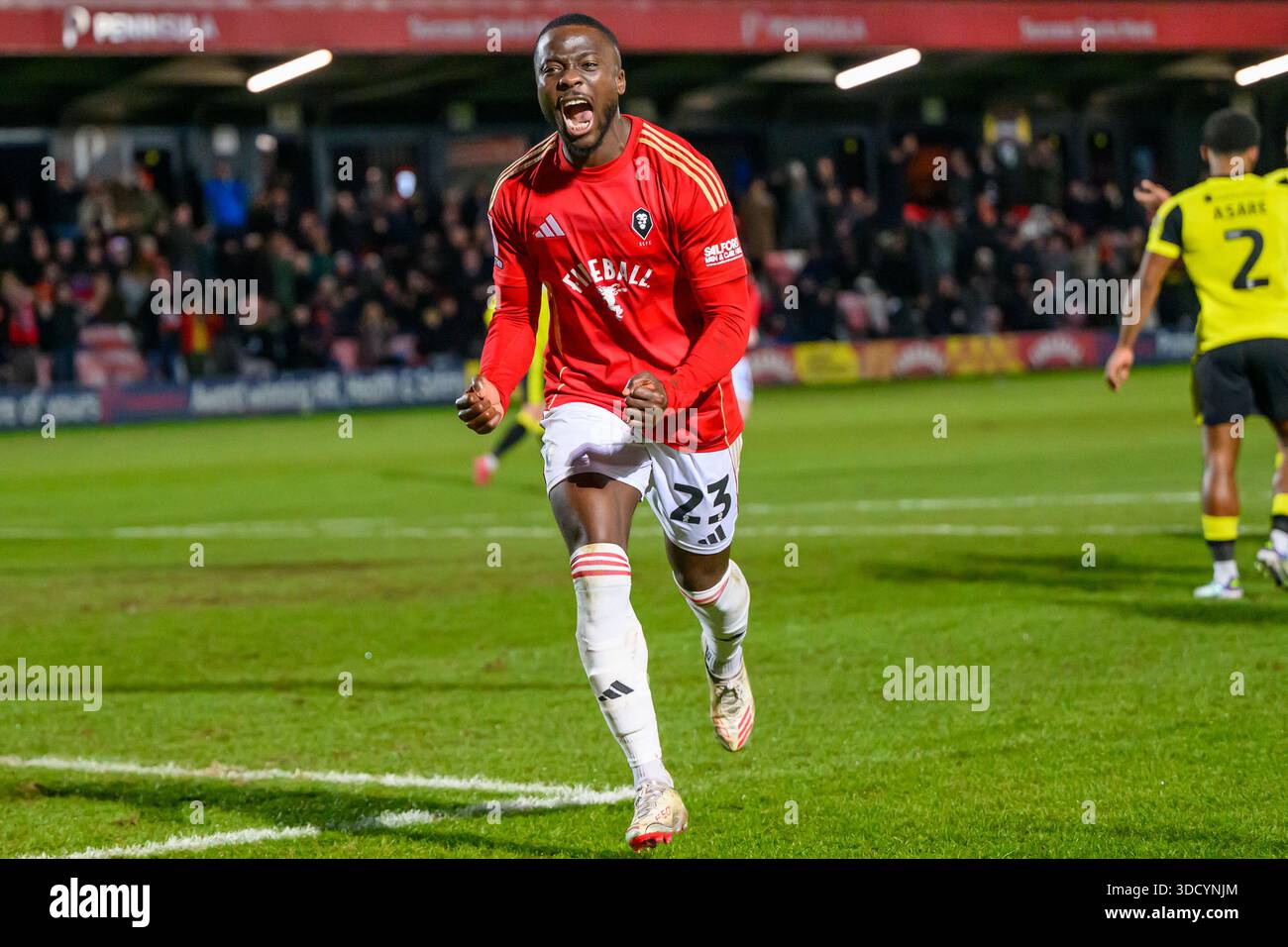 Daniel Udoh of Salford City FC celebrates scoring his side's first goal ...