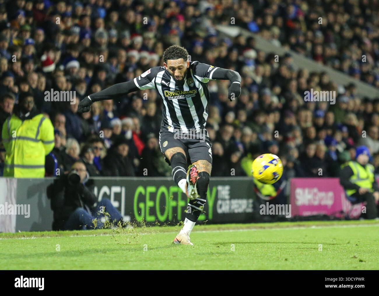Kellan Gordon of Notts County crosses the ball during the Sky Bet ...