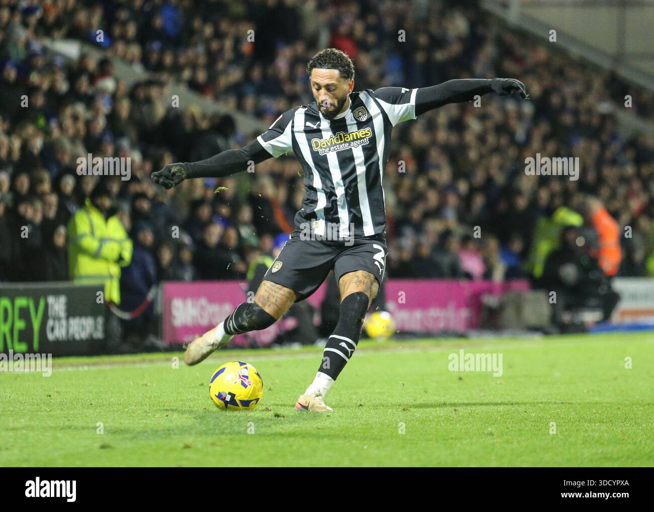 Kellan Gordon of Notts County crosses the ball during the Sky Bet ...