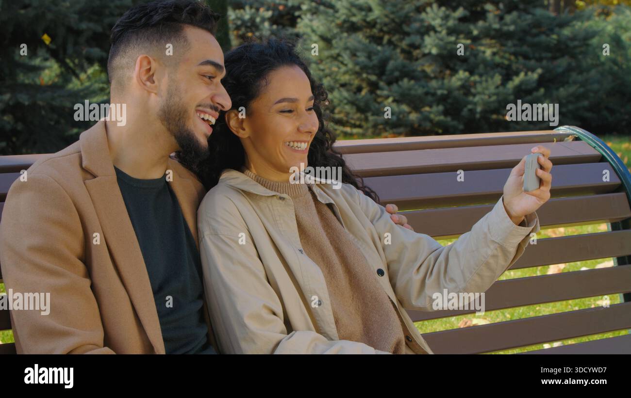 Joyful hispanic couple talk hi-res stock photography and images - Alamy
