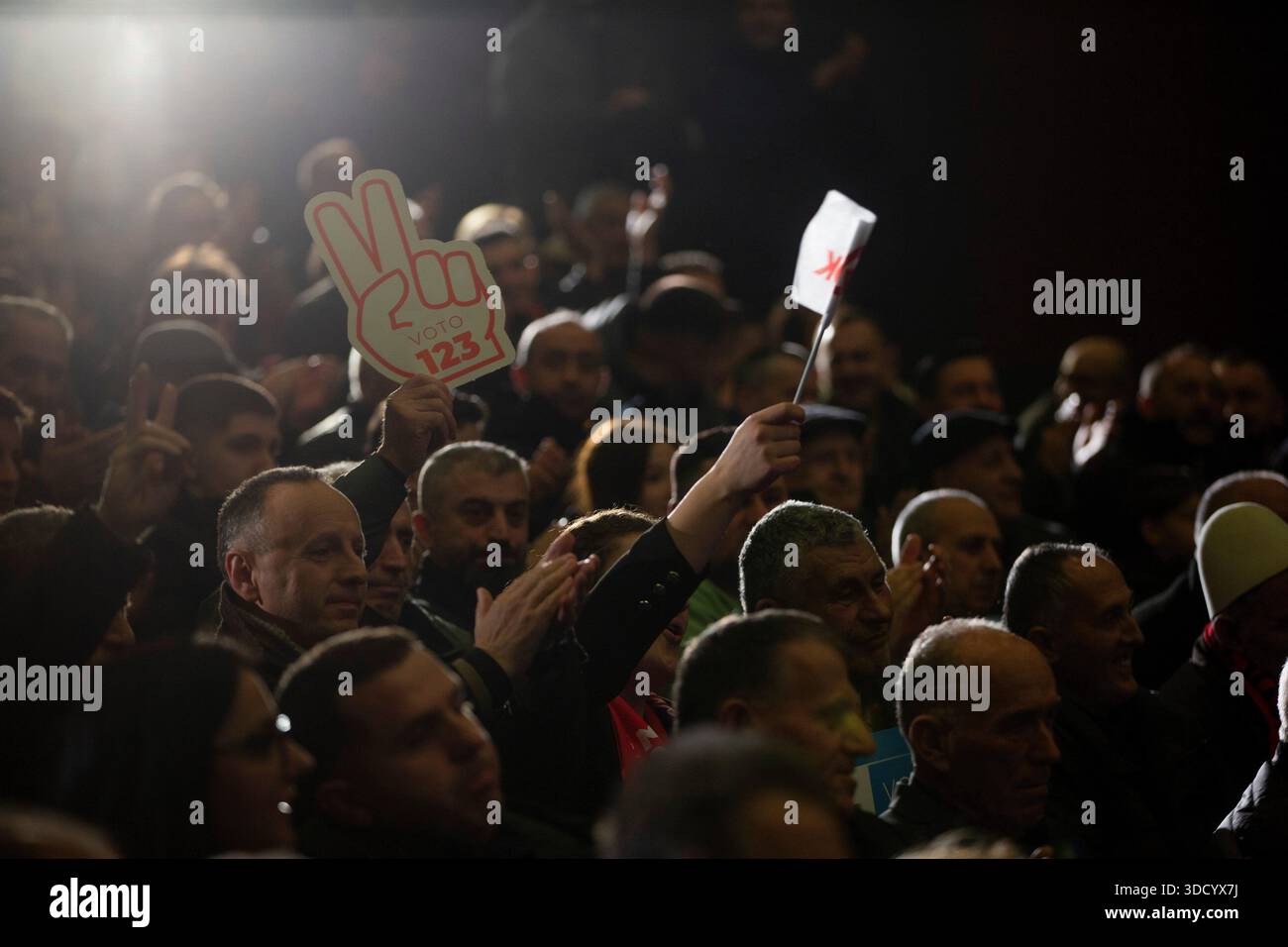 Supporters of LDK (Democratic League of Kosovo) hold a victory sign ...