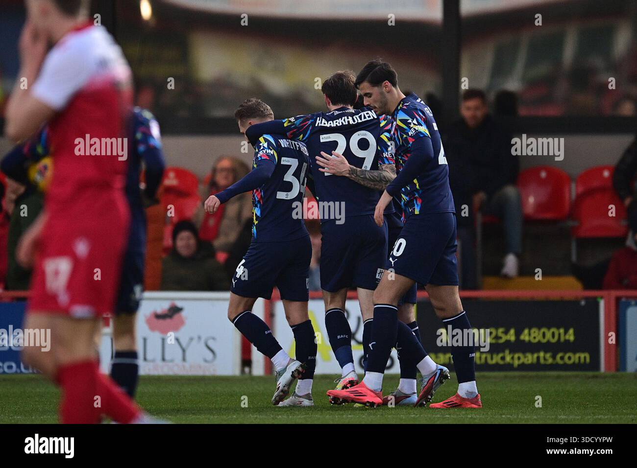 Barrow's Charlie McCann celebrates after scoring their first goal ...