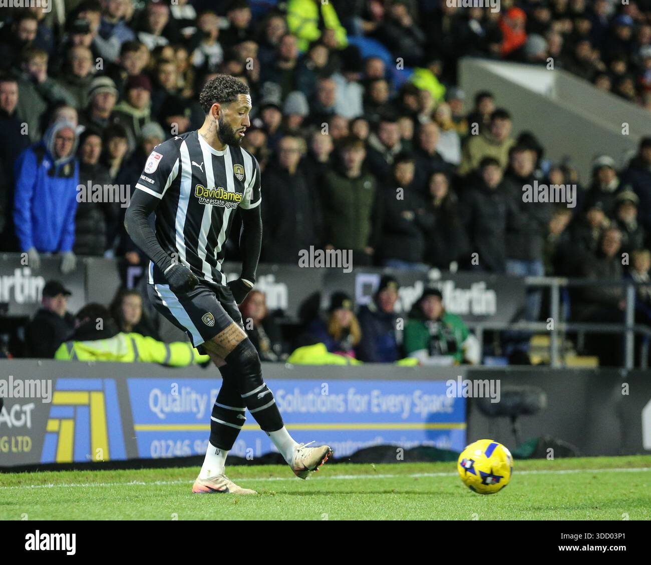 Kellan Gordon of Notts County passes the ball during the Sky Bet League ...