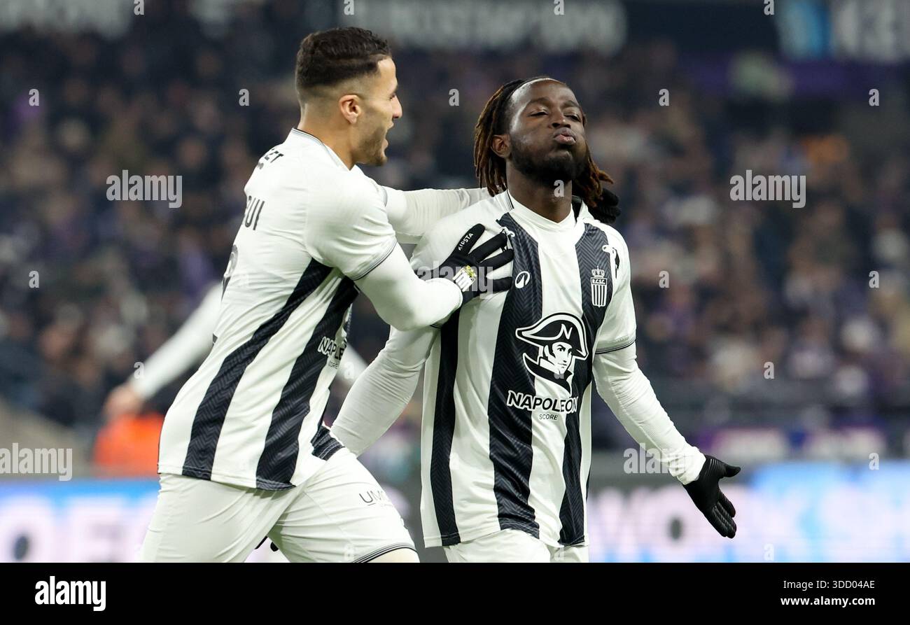 Charleroi's Parfait Guiagon celebrates after scoring during a soccer ...