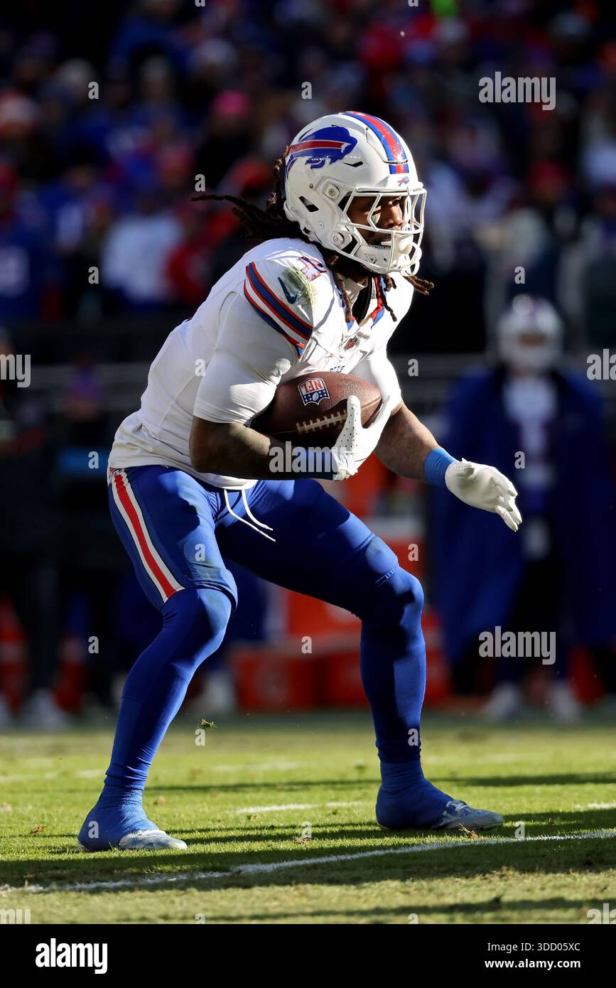 Buffalo Bills running back James Cook (4) runs with the ball during an ...
