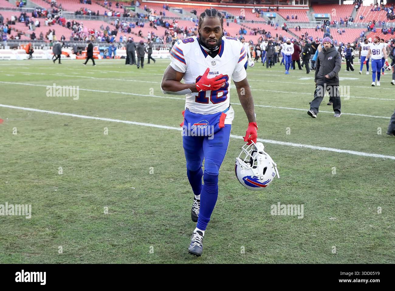 Buffalo Bills wide receiver Elijah Moore (18) runs off of the field ...