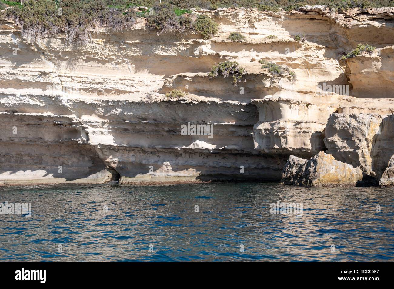 Spectacular chalk cliffs and rugged limestone coastline of the Delimara ...