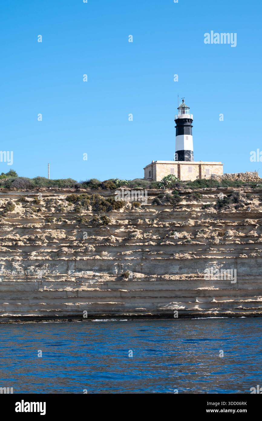 Spectacular chalk cliffs and rugged limestone coastline of the Delimara ...