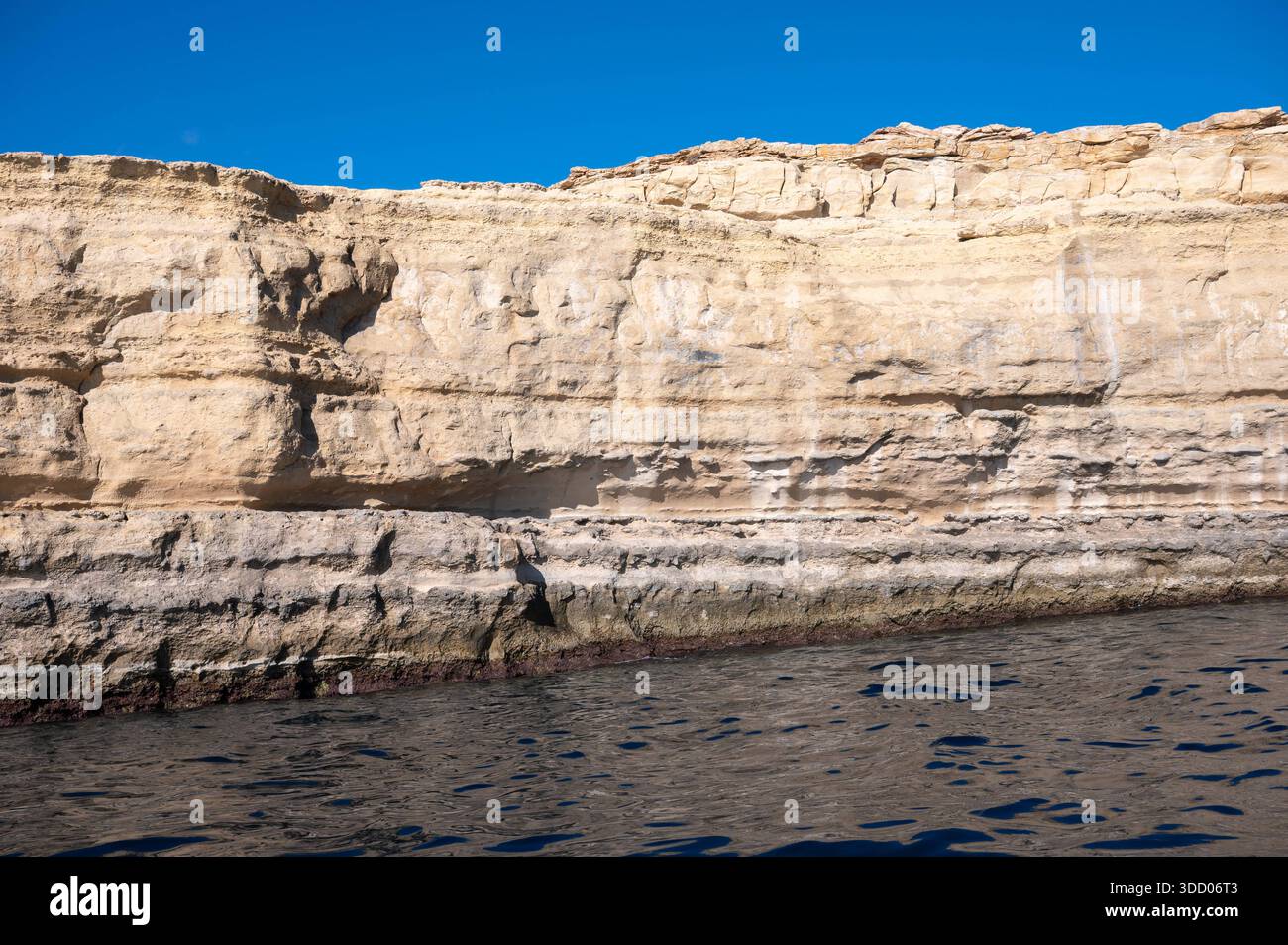Spectacular chalk cliffs and rugged limestone coastline of the Delimara ...