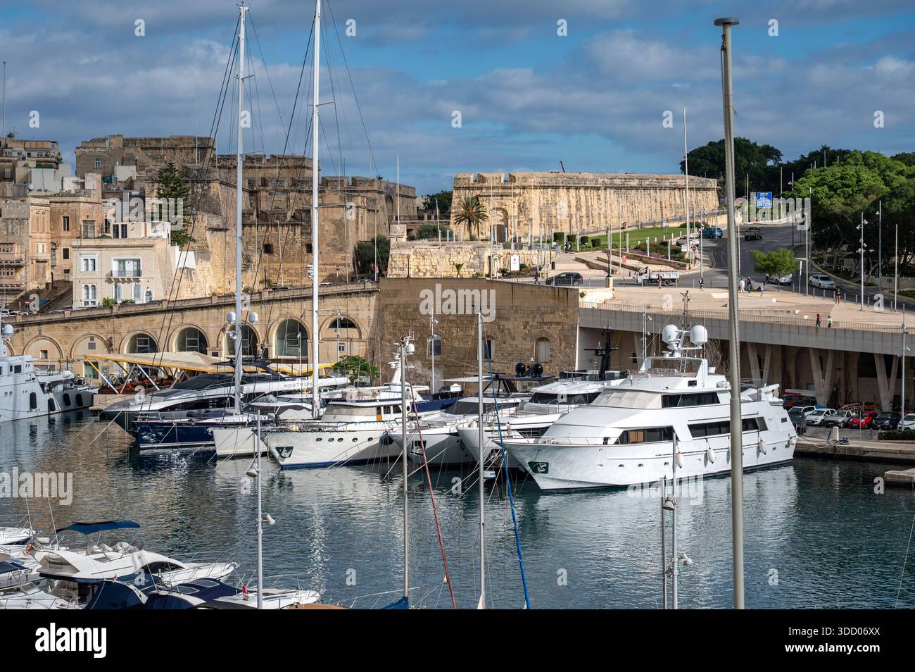 Elevated view over Senglea L-Isla with Birgu harbor, boats on the water ...