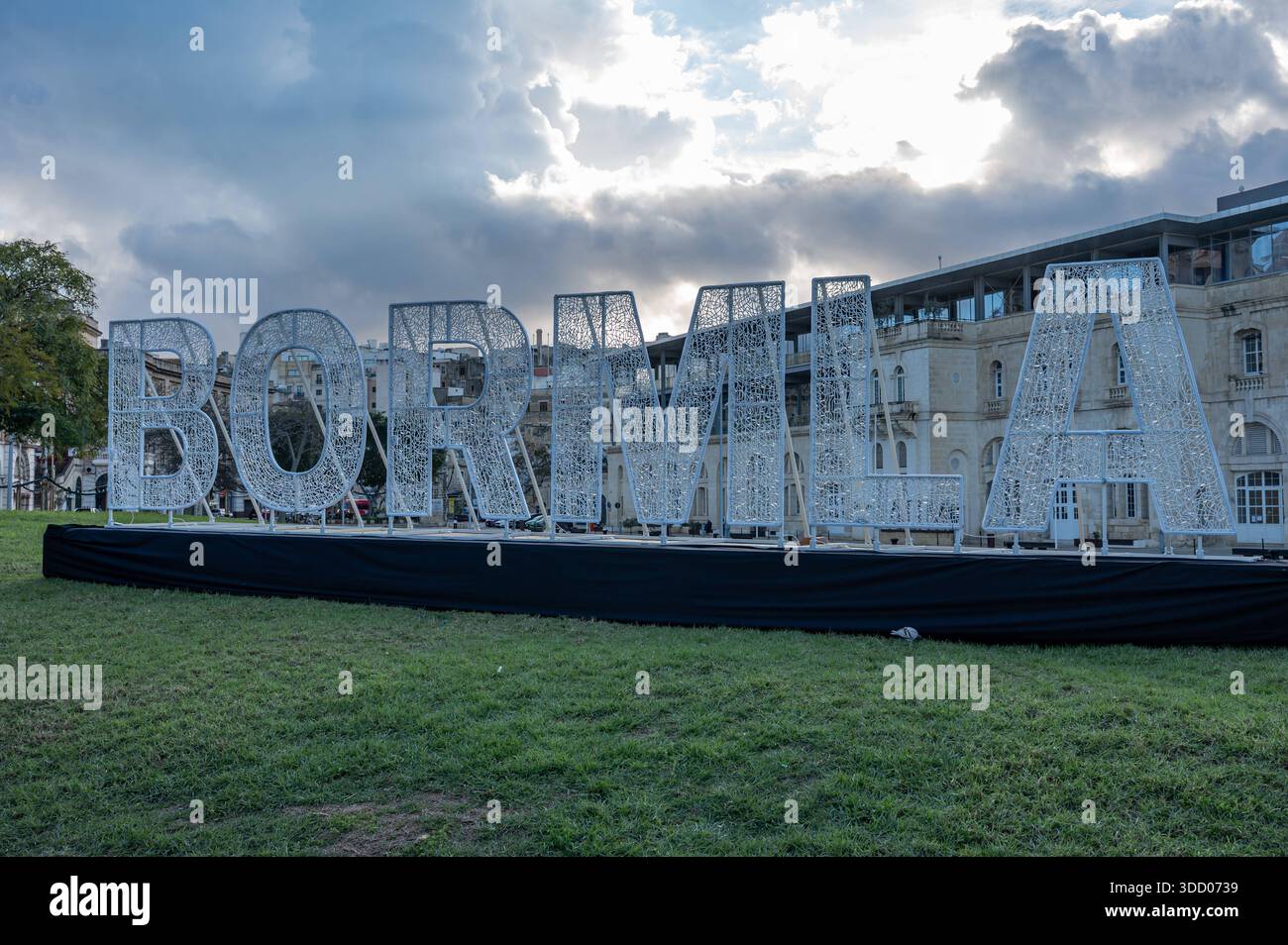 Decorated narrow steep streets with staircases in the village of Bormla ...