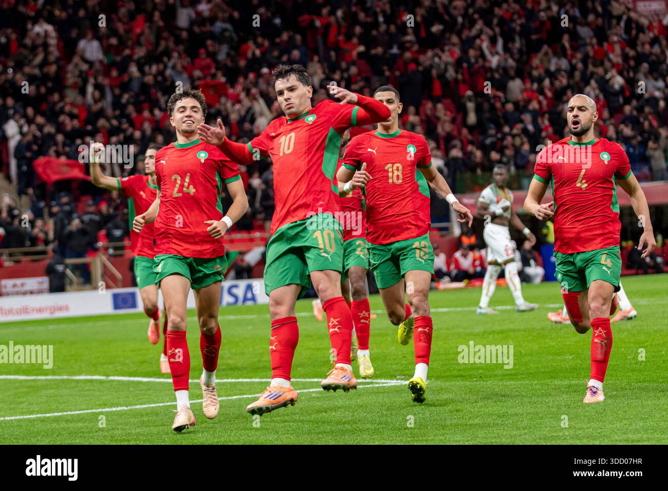Brahim Díaz of Morocco celebrates scoring a goal with team-mates during ...