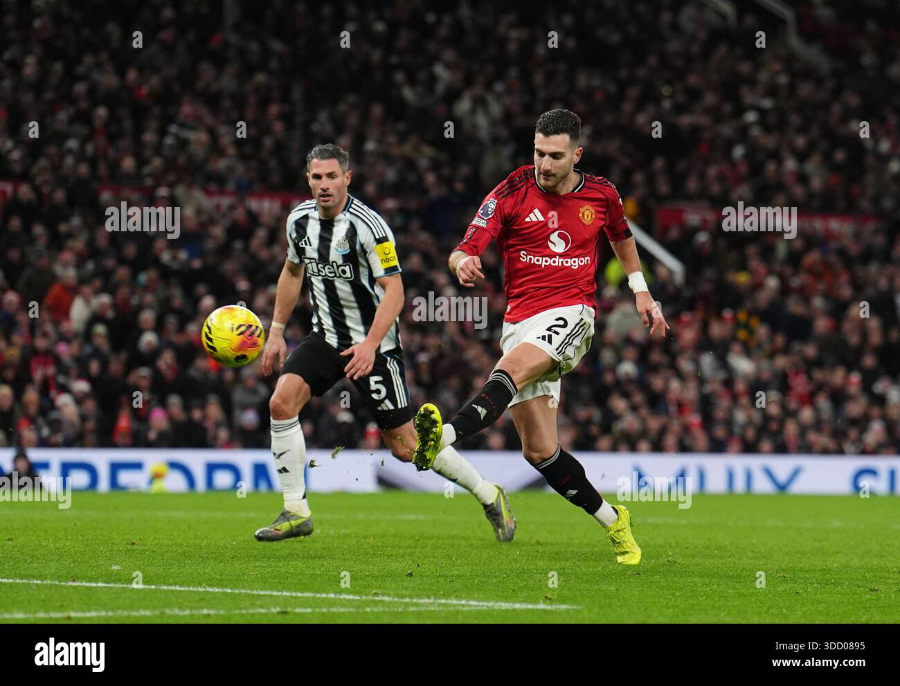 Manchester United's Diogo Dalot has a shot on goal during the Premier ...