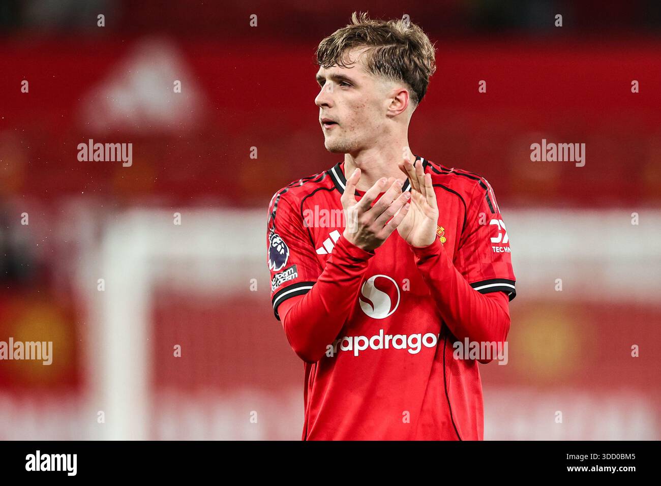 Jack Fletcher of Manchester Untied applauds the fans after the game ...