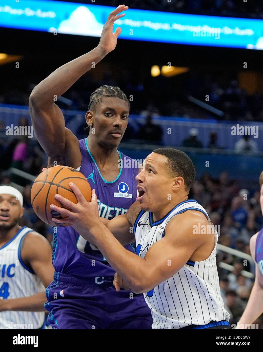 Orlando Magic guard Desmond Bane, right, goes up for a shot against ...