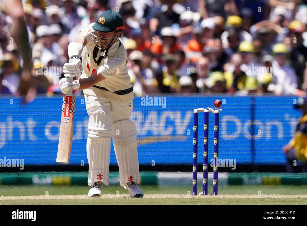 Australia's Travis Head is bowled by England’s Brydon Carse (not ...