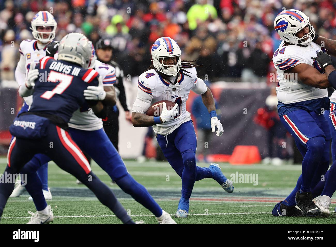 Buffalo Bills' James Cook III runs against the New England Patriots ...