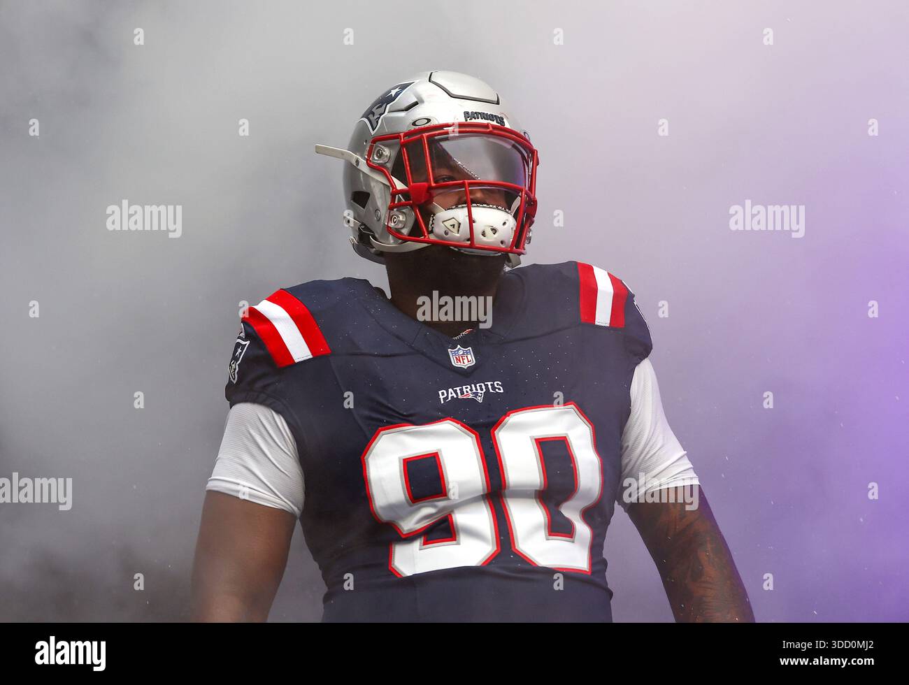 New England Patriots' Christian Barmore takes the field for an NFL ...