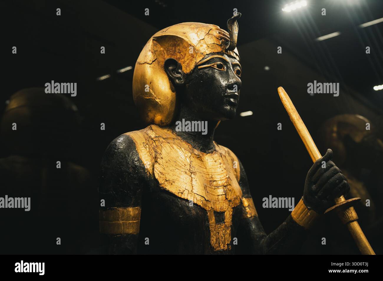 A statue inside the Tutankhamun Halls. (Photo by Lounis Tiar / SOPA ...