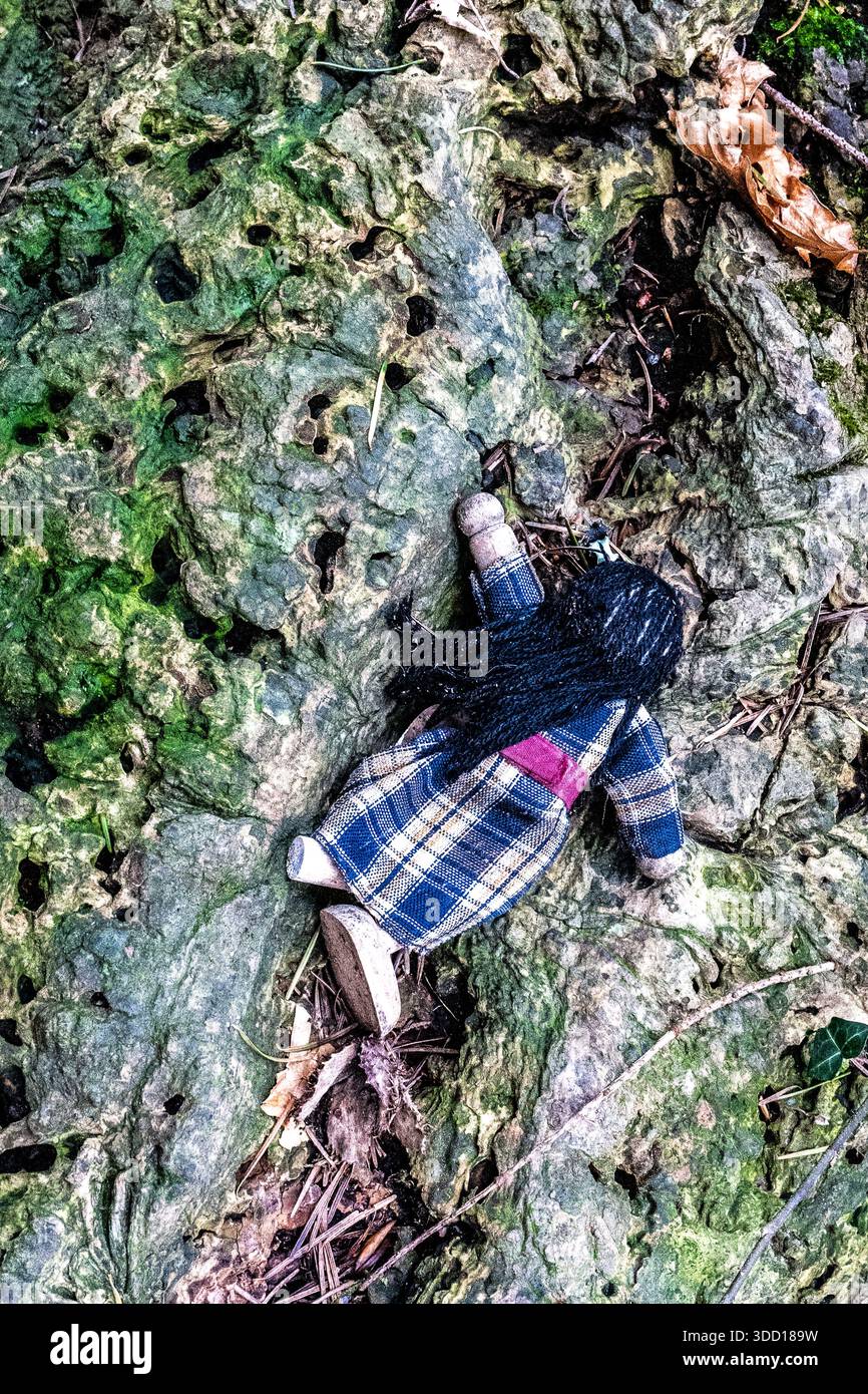 Abandoned Wooden Doll Lying in Forest Moss and Leaves – Surreal and ...