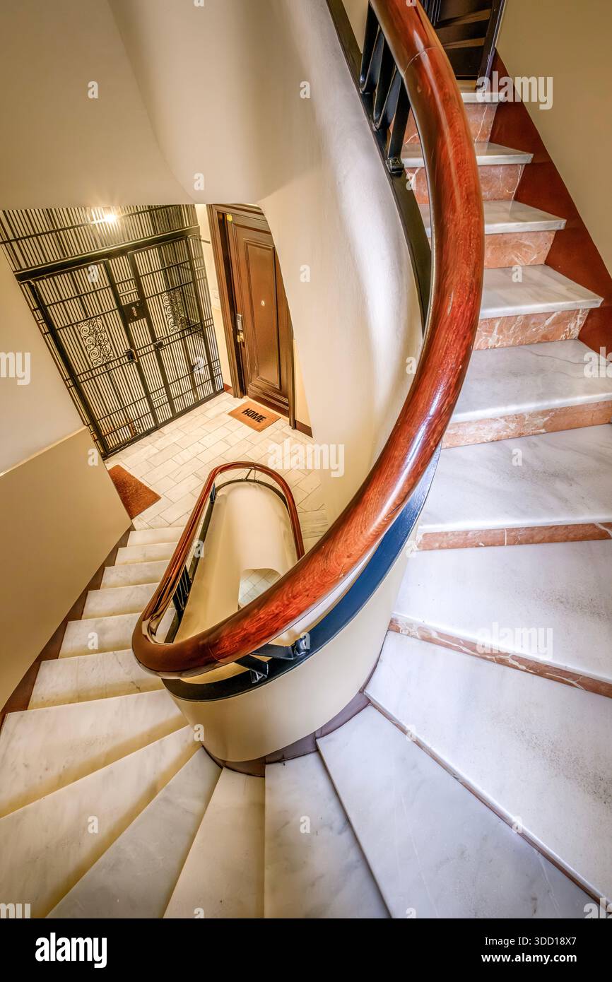 Classic Spiral Staircase With Wooden Handrail In Barcelona Building ...