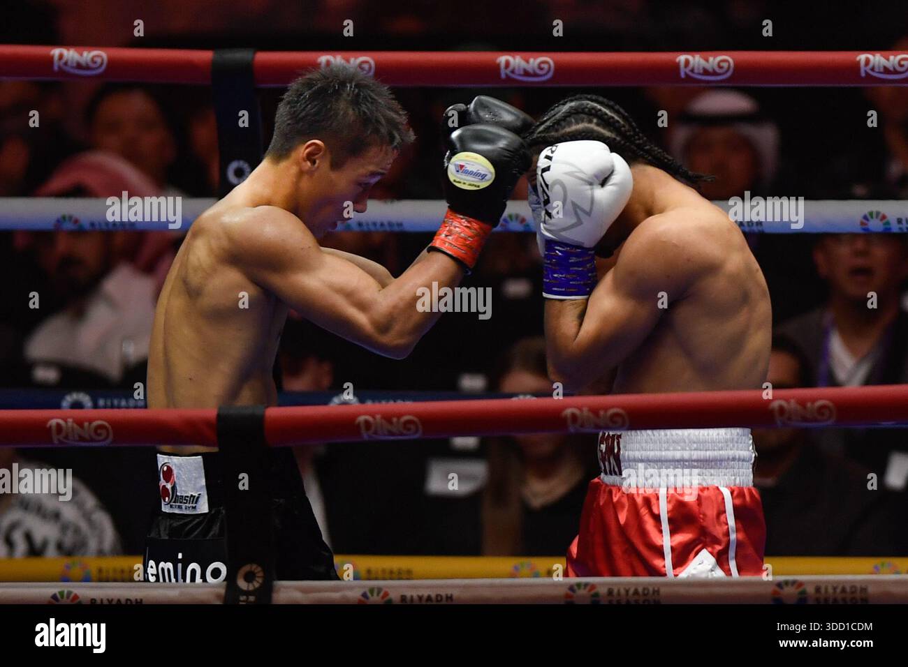 Japan's Taiga Imanaga, left, fights Eridson Garcia of Dominican ...