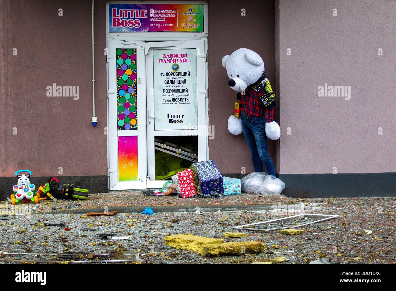 Debris covers the ground outside a day care centre in an apartment ...