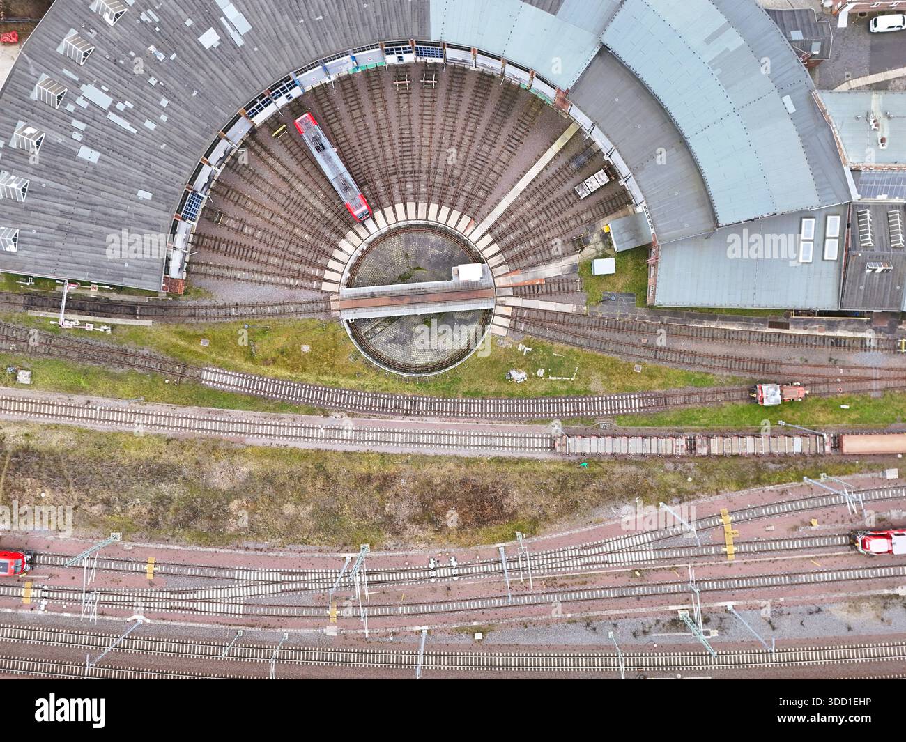 Aerial Top View of Railway Roundhouse with Turntable and Red Train ...